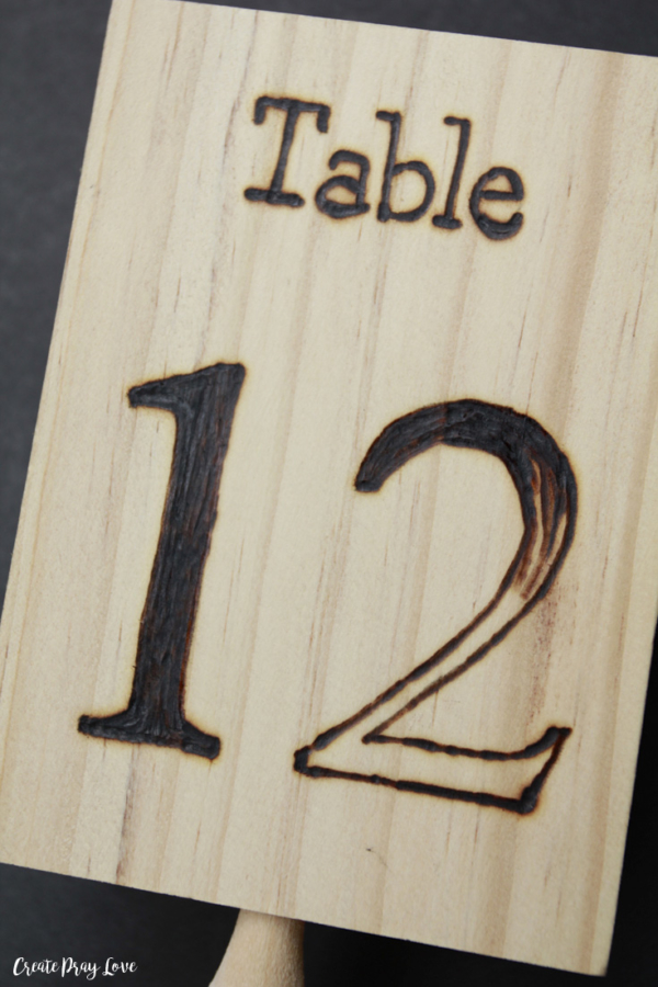 Make Rustic Wedding Table Numbers With This Woodburning Tutorial